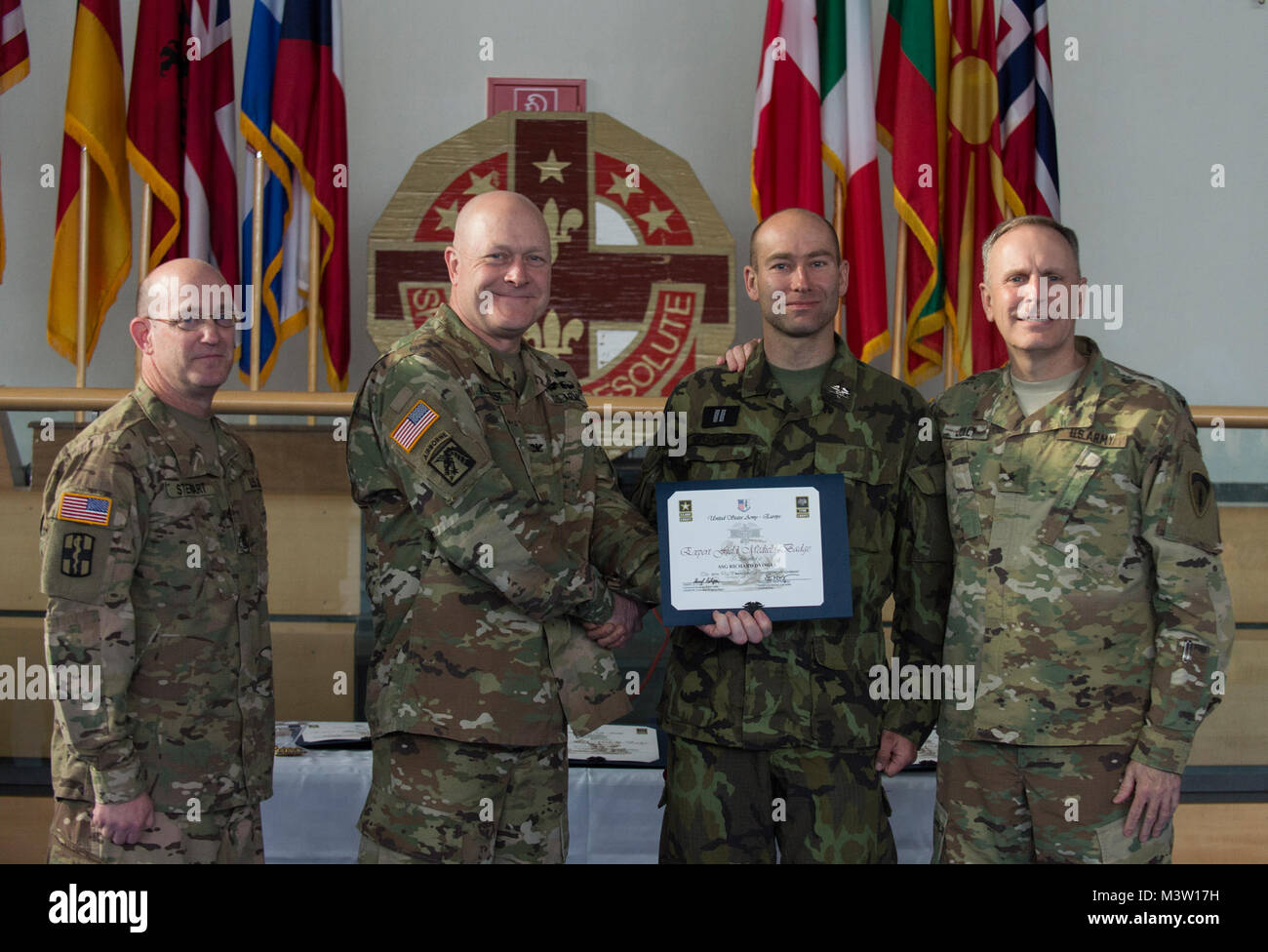 GRAFENWOEHR, Germany – Staff Sergeant Richard Dvorak (center right), a ...