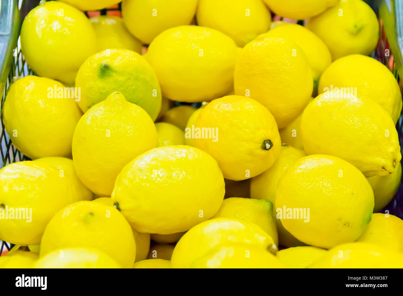 Photo of background with yellow ripe lemon Stock Photo - Alamy