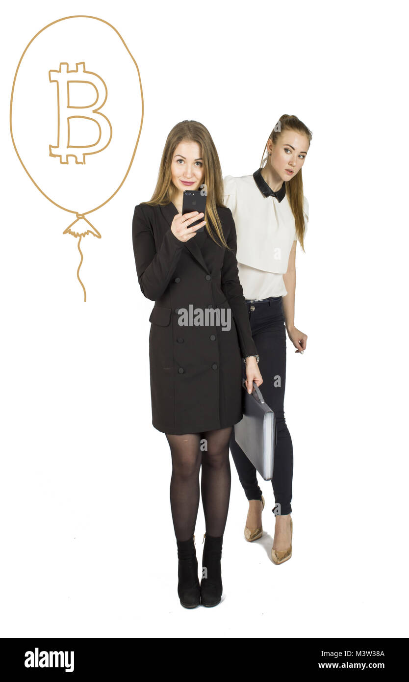 Beautiful women standing over white background with bitcoin sketches ...