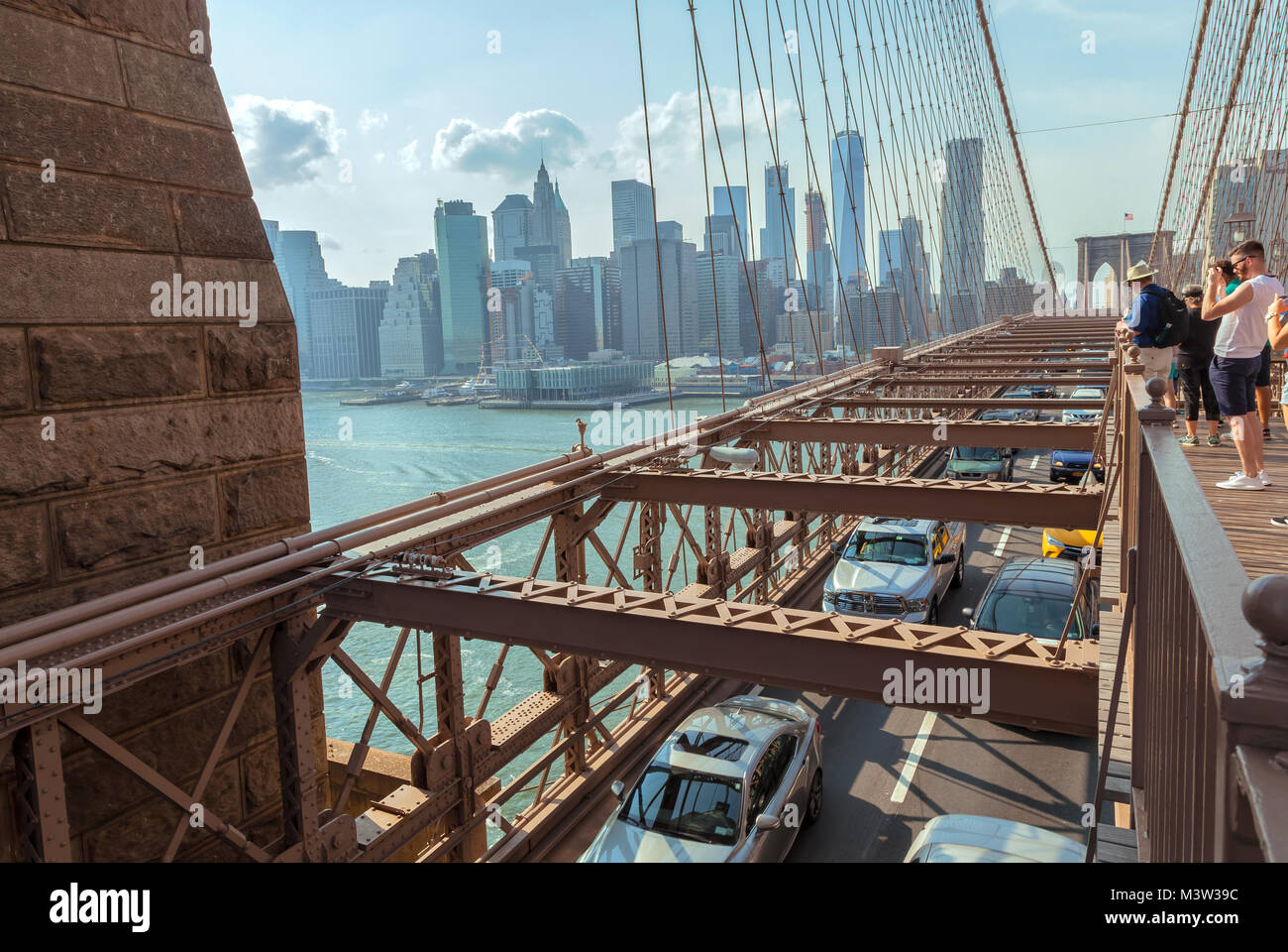 View of the Lower Manhattan from the Brooklyn Bridge in New York City ...
