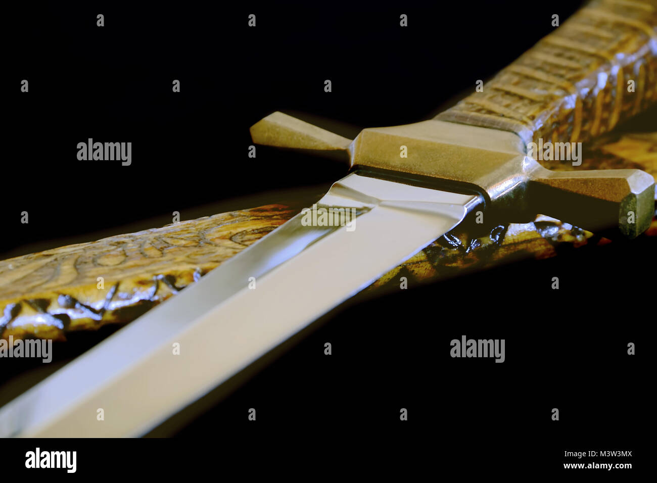 Image of cold weapon on black background Stock Photo - Alamy