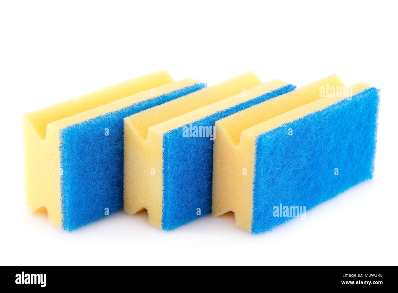 Pile of sponges isolated on white background Stock Photo - Alamy