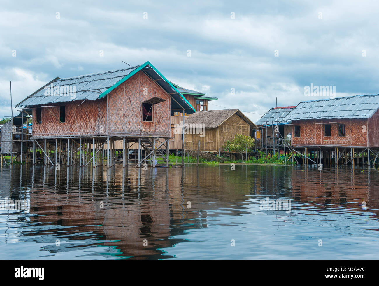 Traditional wooden stilt houses in Inle lake Myanmar Stock Photo - Alamy