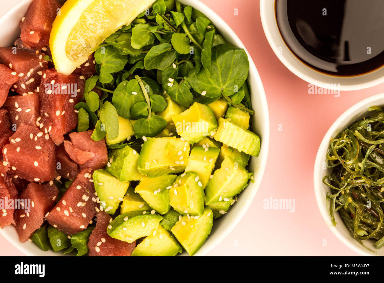 Hawaiian Style Tuna And Avocado Sashimi Poke Food Bowl Against A Light ...