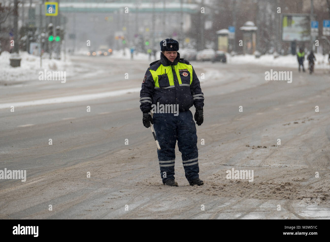 Traffic policeman on duty at winter Stock Photo - Alamy