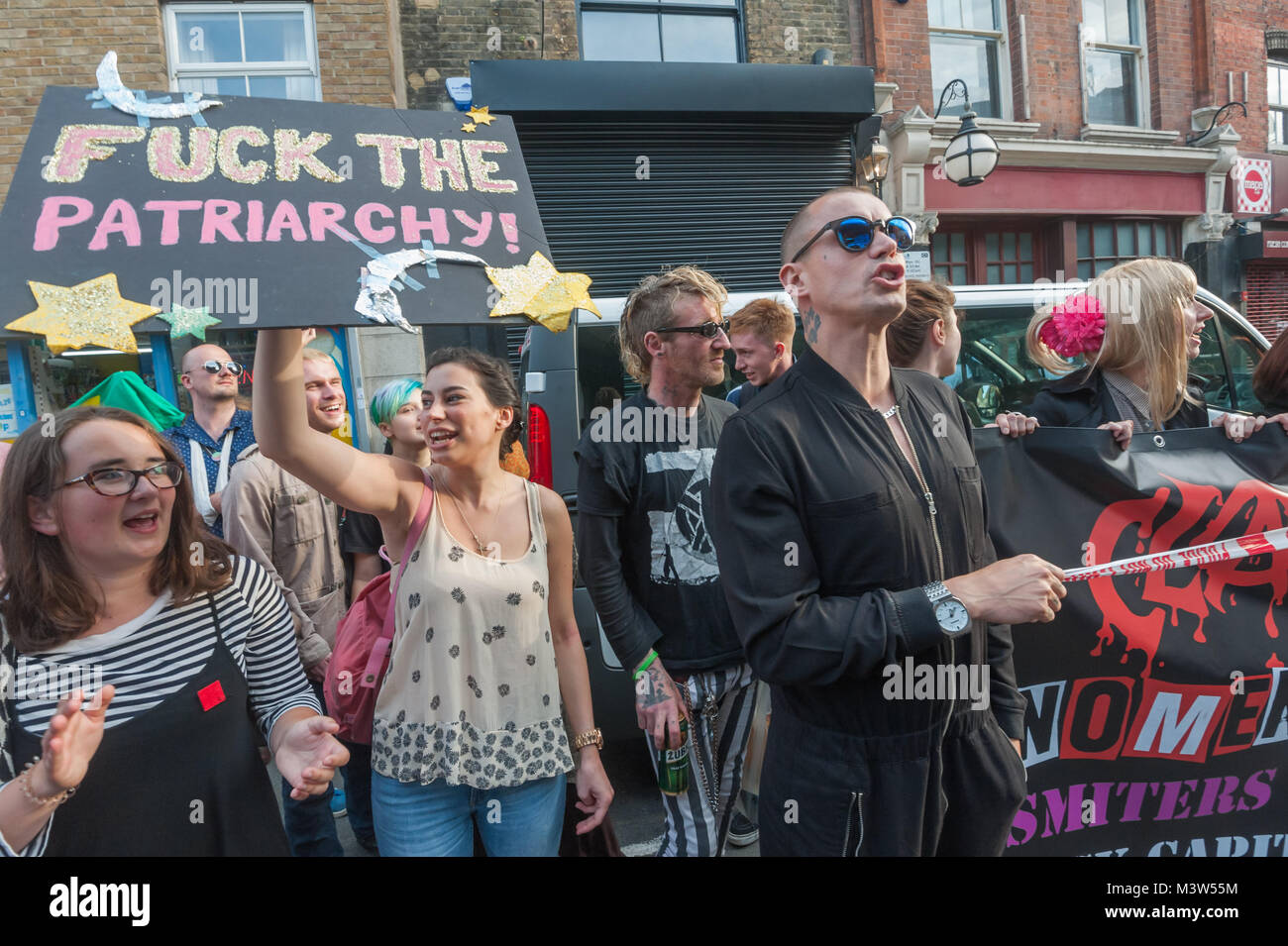Protesters, including local residents, posed for photographs with ...
