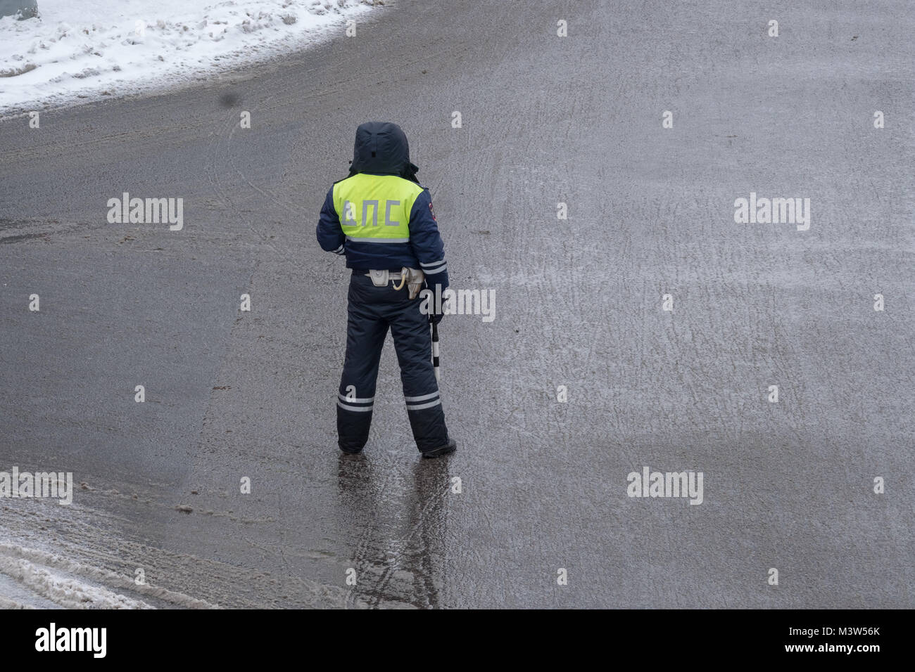 Traffic policeman on duty at winter Stock Photo - Alamy