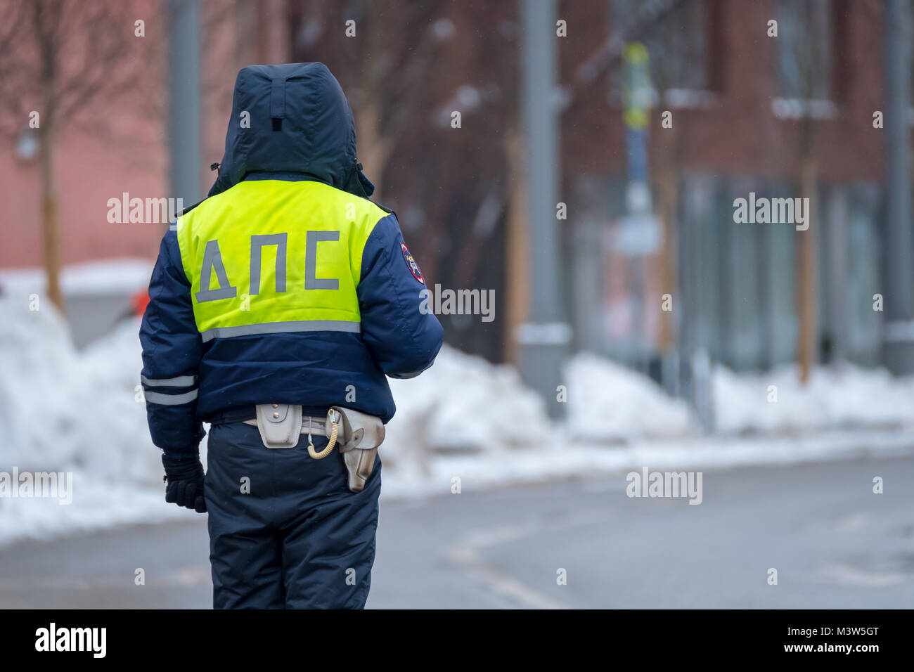 Traffic policeman on duty at winter Stock Photo - Alamy