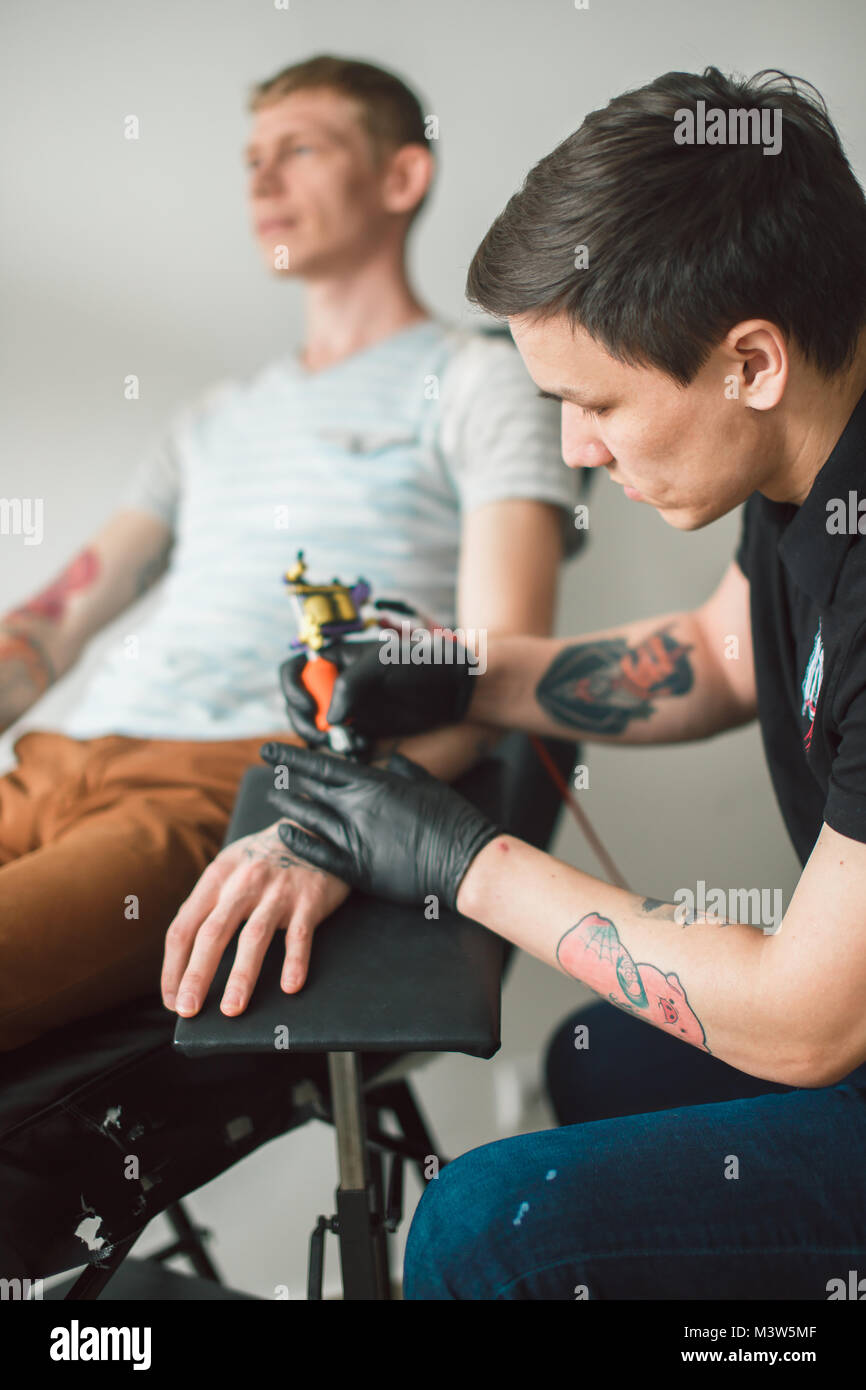 Master of tattoo fill circuit tattoo Stock Photo - Alamy