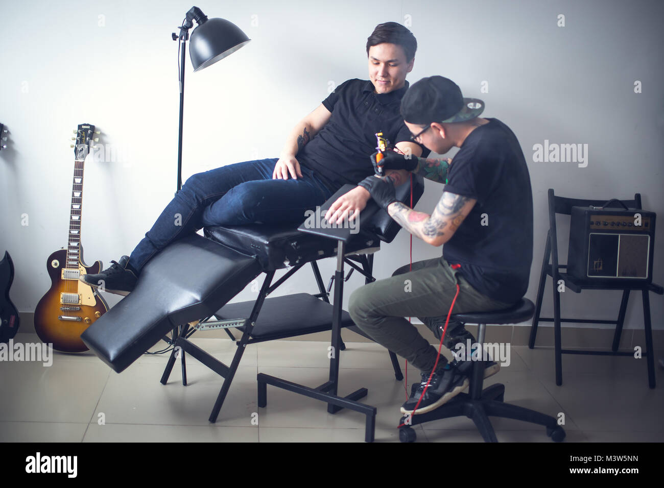 Master of tattoo fill circuit tattoo Stock Photo - Alamy