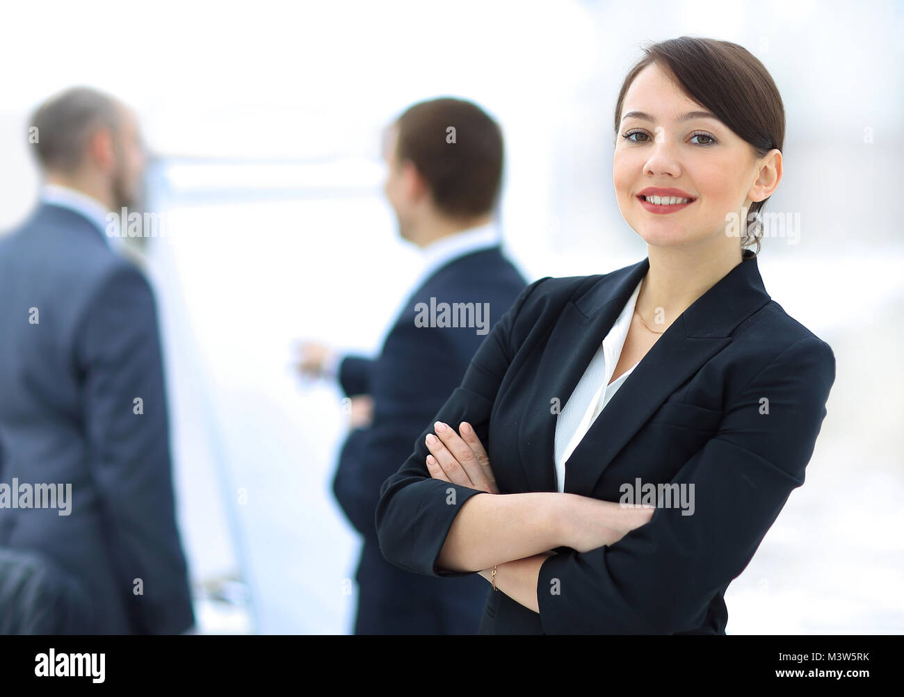 Manager helping staff in busy hi-res stock photography and images - Alamy