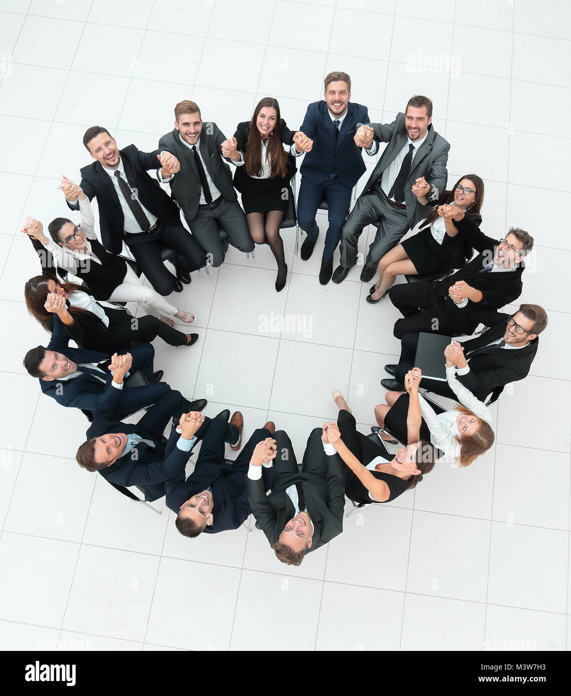 concept of team building .large successful business team sitting in a ...