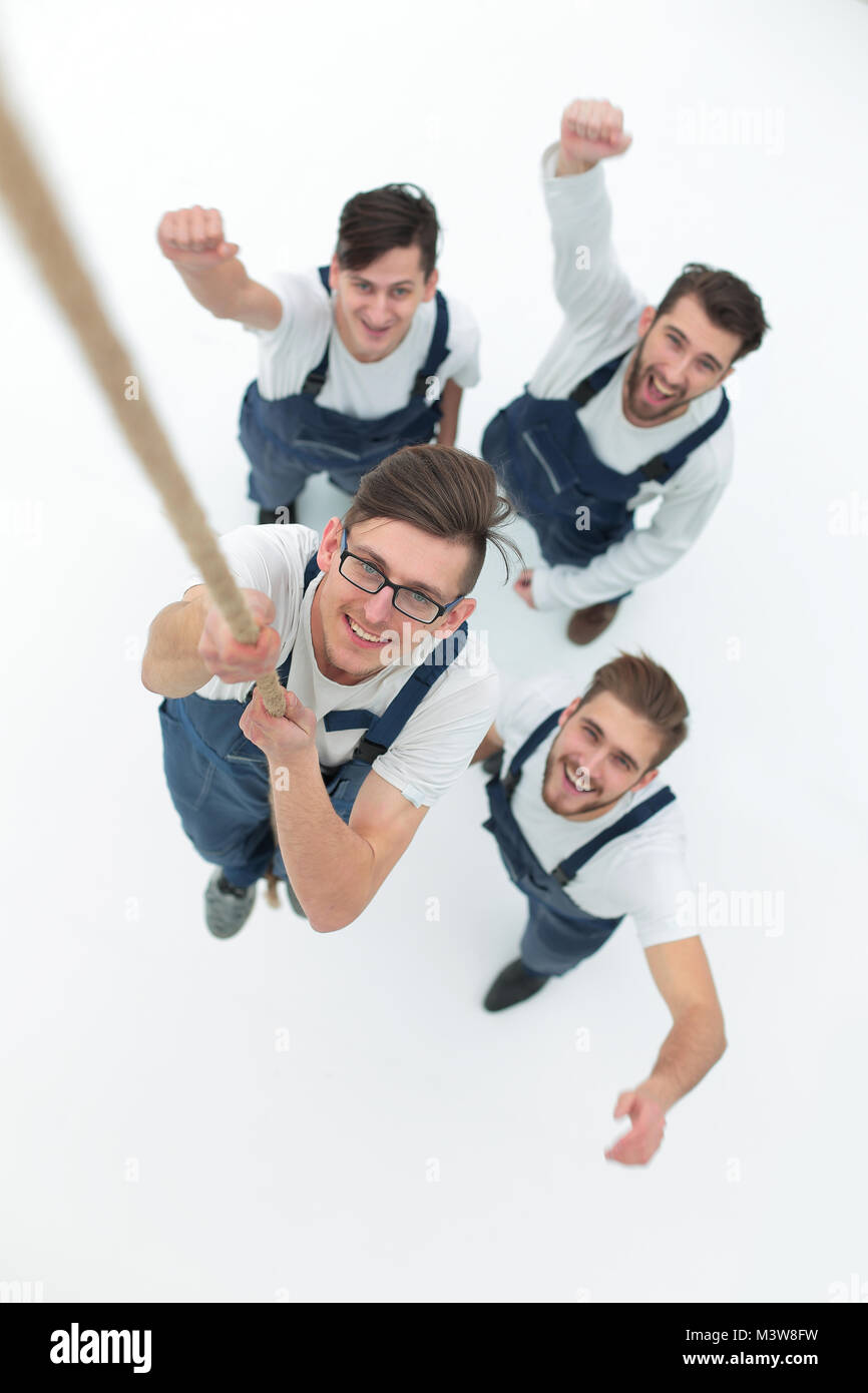team, helping the leader to climb up the rope Stock Photo - Alamy