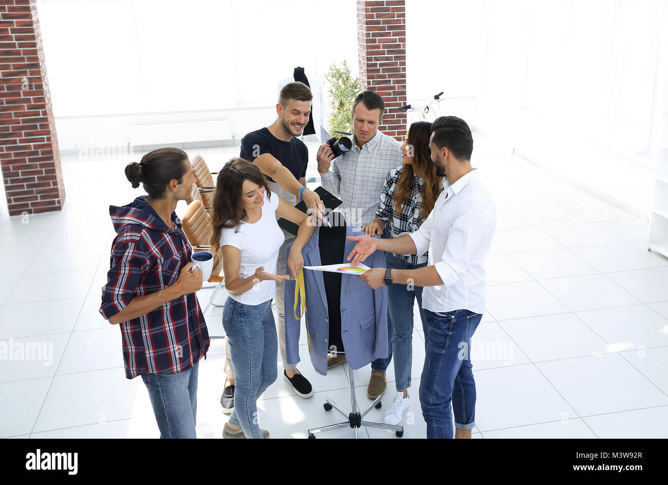 Designers working new models hi-res stock photography and images - Alamy