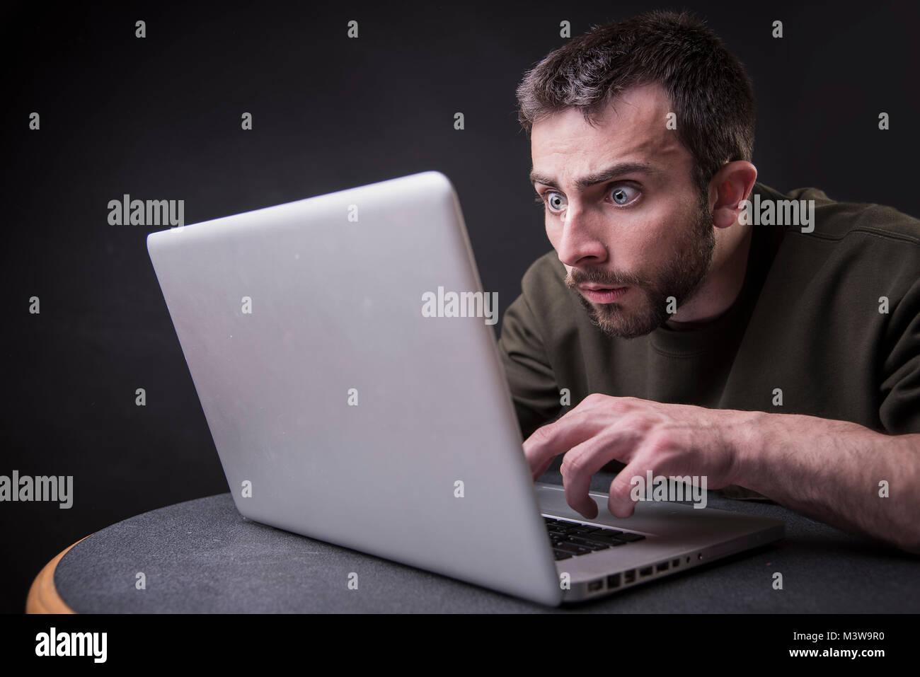 Shocking laptop content Stock Photo - Alamy
