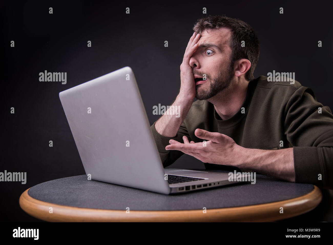 Shocking laptop content Stock Photo - Alamy
