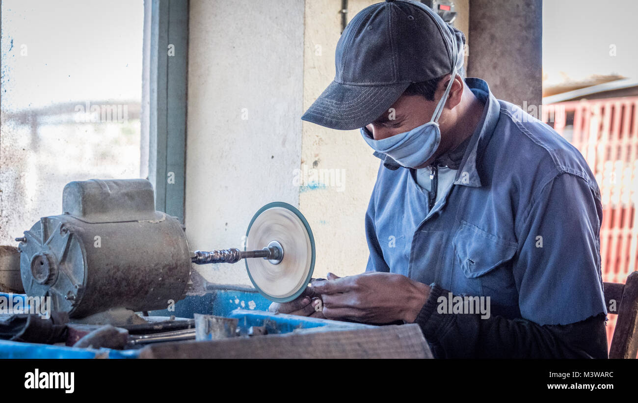 Man Making Spoons from Zebu Horn for Tourists, Antsirabe, Madagascar ...