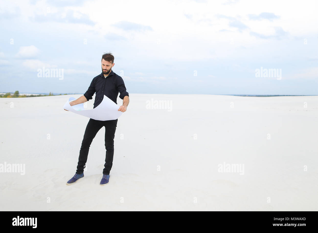 Archeologist man reviewing plan of excavations in village talk Stock ...