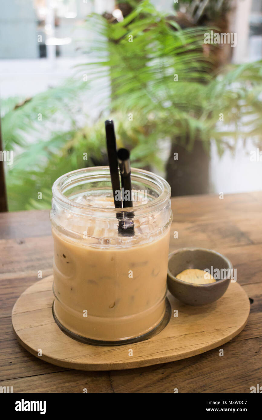 Delicious iced coffee with cookie, stock photo Stock Photo - Alamy