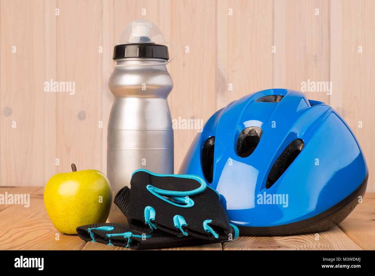 cycling - set of objects for playing sports on a wooden background ...