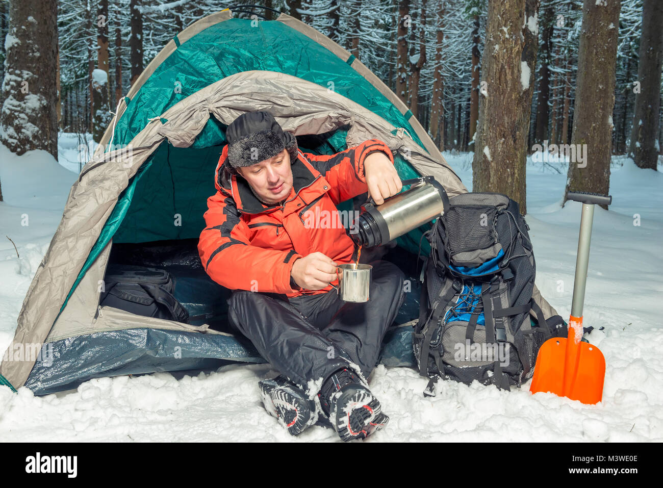 halt in a hike in the winter forest - a break for hot tea Stock Photo ...