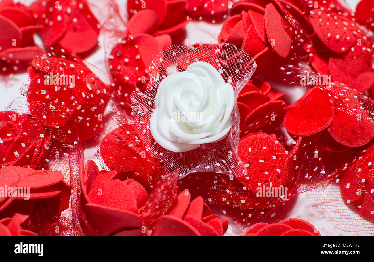 red and white valentine rose made of plastic Stock Photo - Alamy