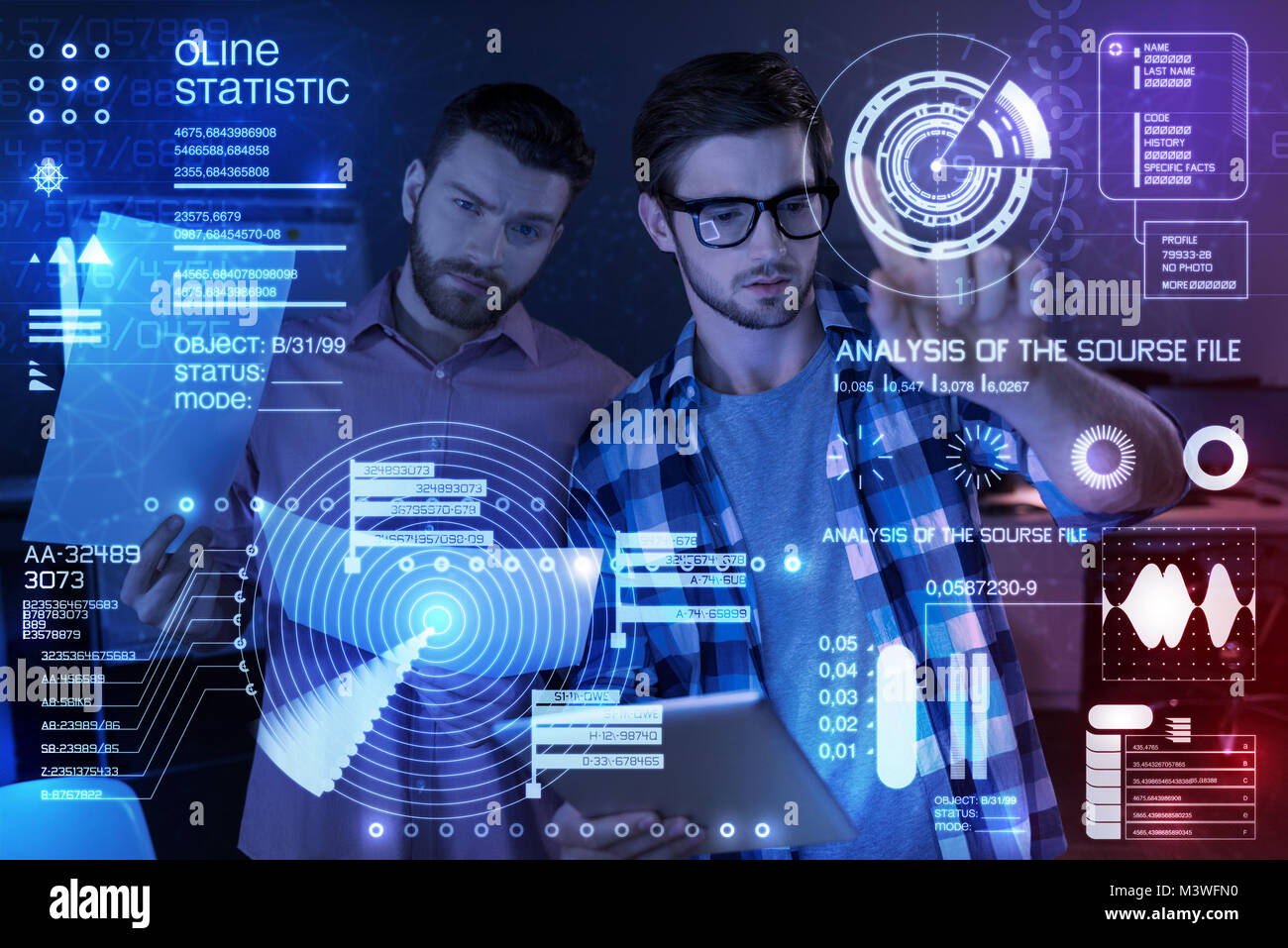 Professional IT men checking the app Stock Photo - Alamy