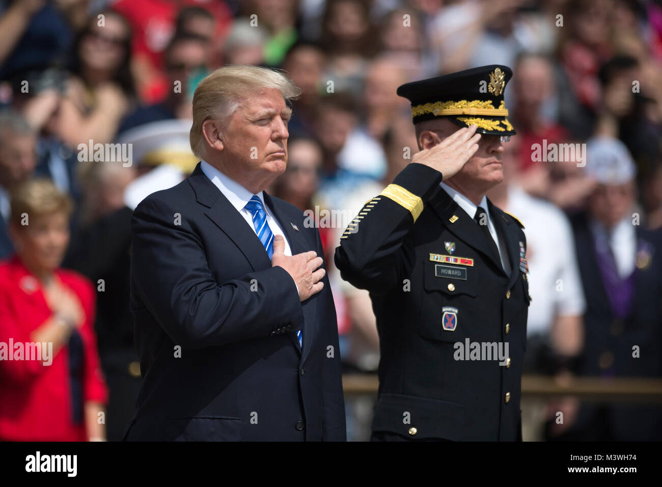 President Donald J. Trump and Maj. Gen. Michael L. Howard salute during ...