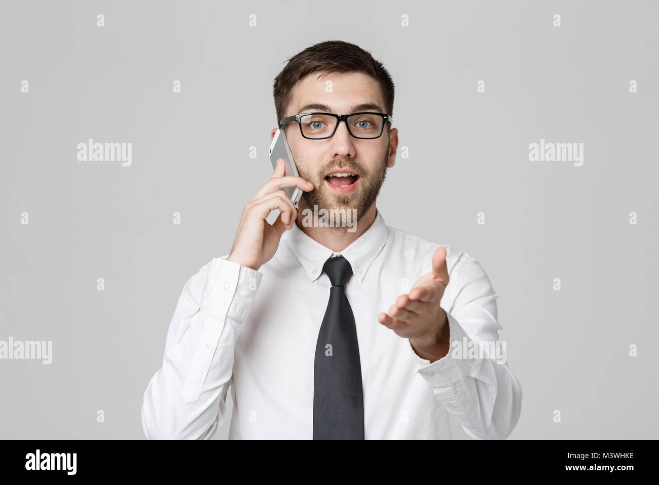 Business Concept - Portrait young handsome angry business man in suit ...