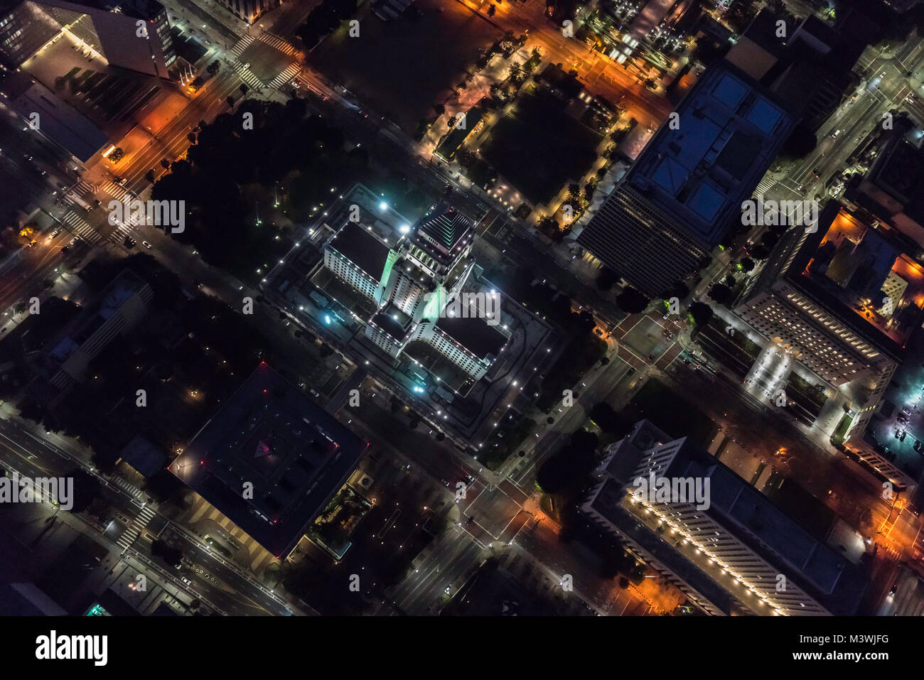 Night aerial view of Los Angeles City Hall and downtown civic center ...