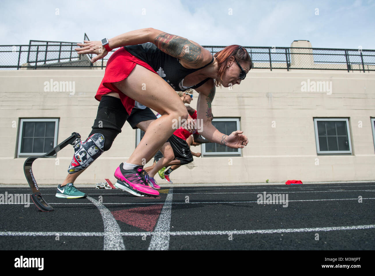 Marine Corps veteran Sarah Rudder teaches starting from blocks during ...