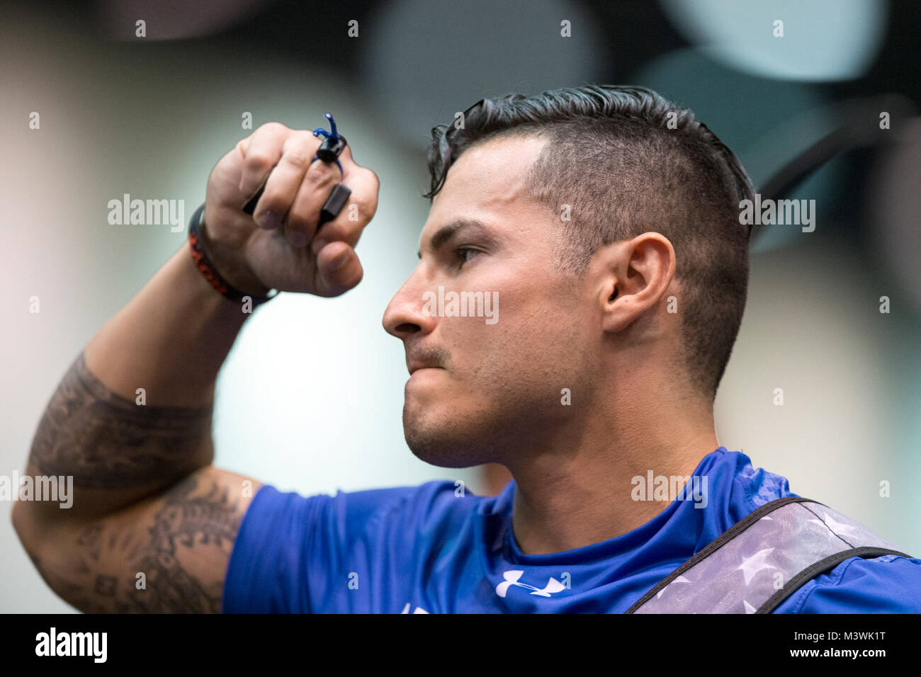 Air Force Staff Sgt. Vincent Cavazos reacts to a winning shot that ...