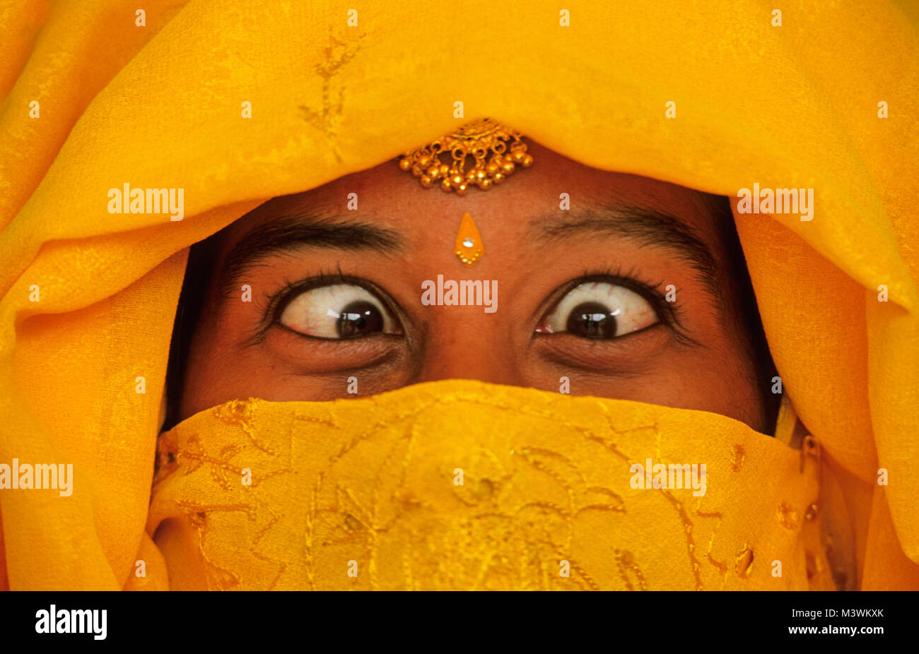 Squinting one eye hi-res stock photography and images - Alamy