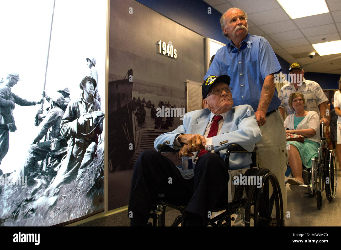 USS Arizona survivor Navy Seaman First Class Donald Stratton, seated ...