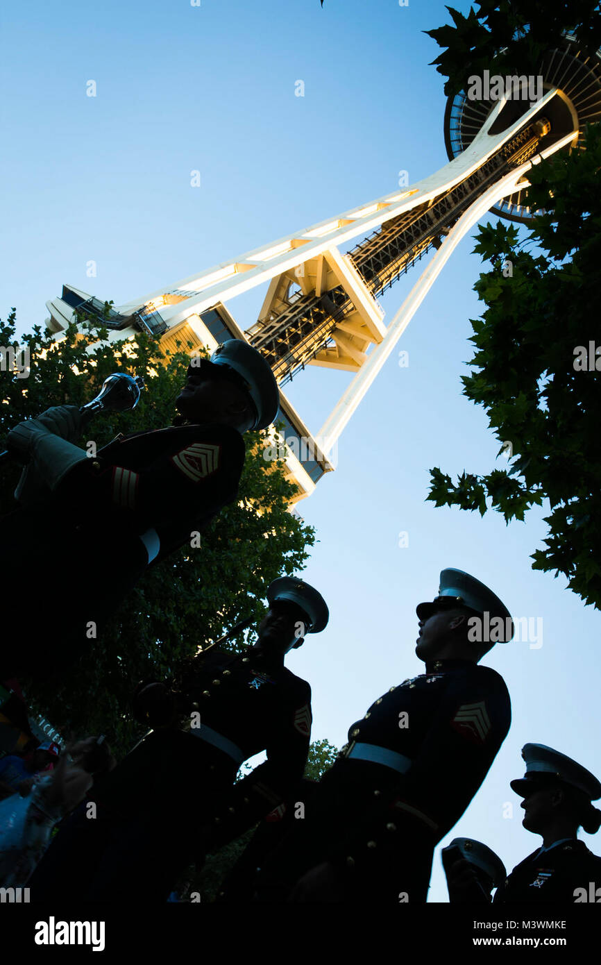 Marine musicians with the 1st Marine Division Band await the start of ...