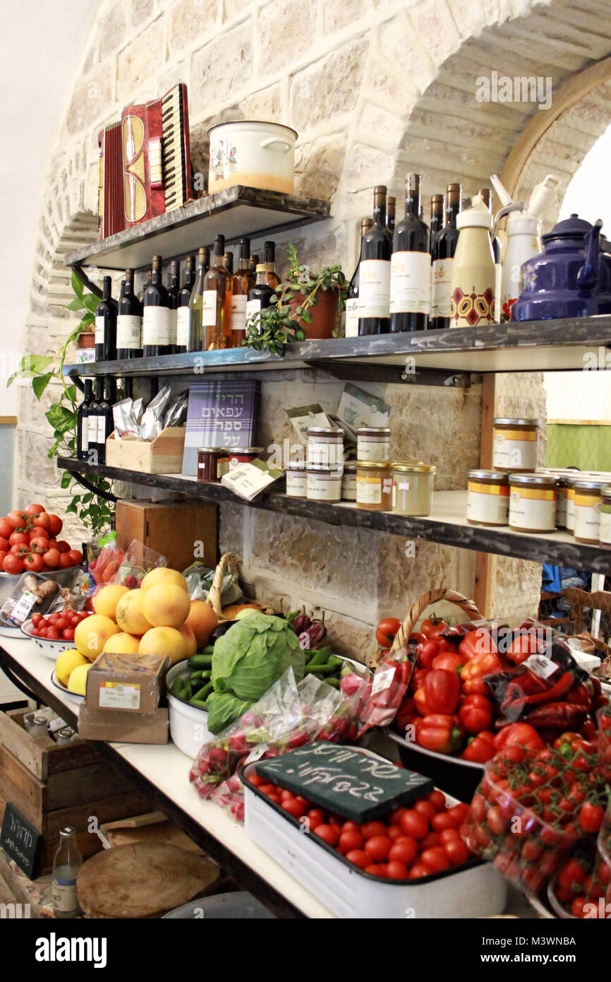 The shelves of a cafe farmers market in Jerusalem are full and ...