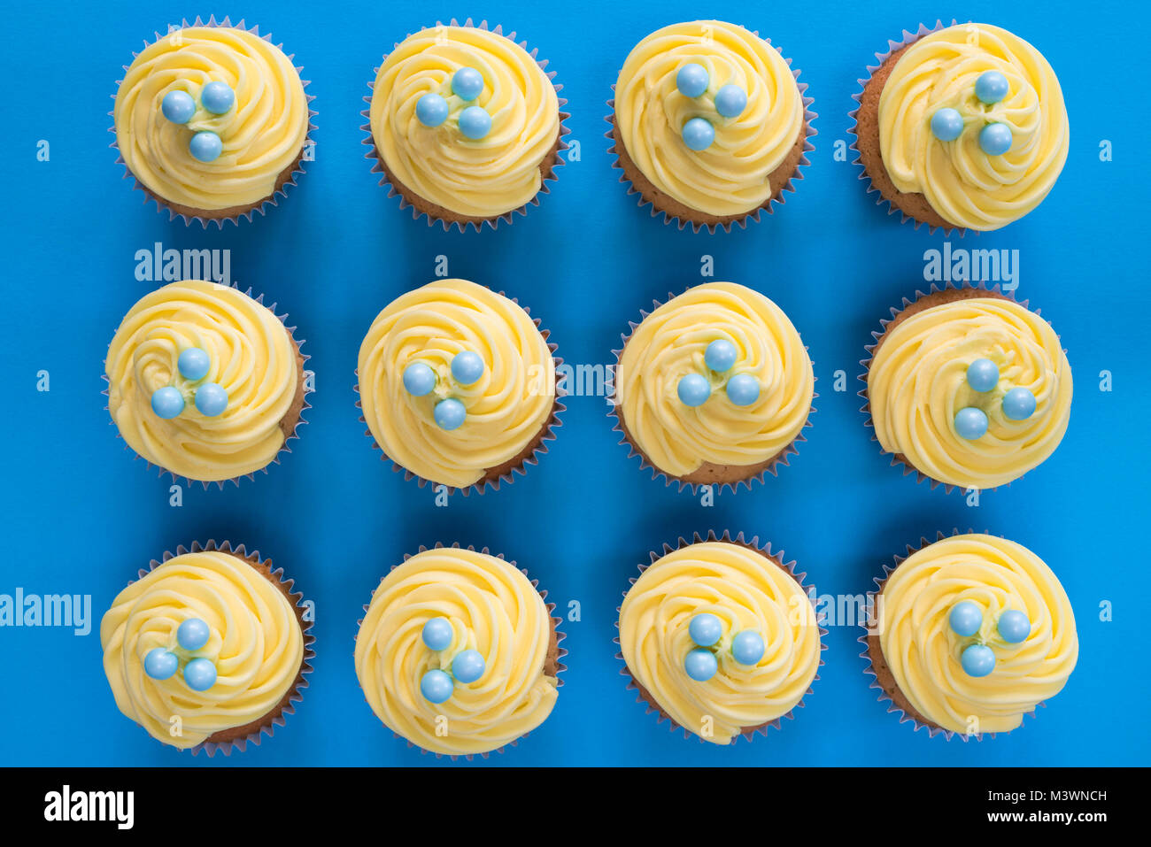Yellow and blue cupcake hi-res stock photography and images - Alamy