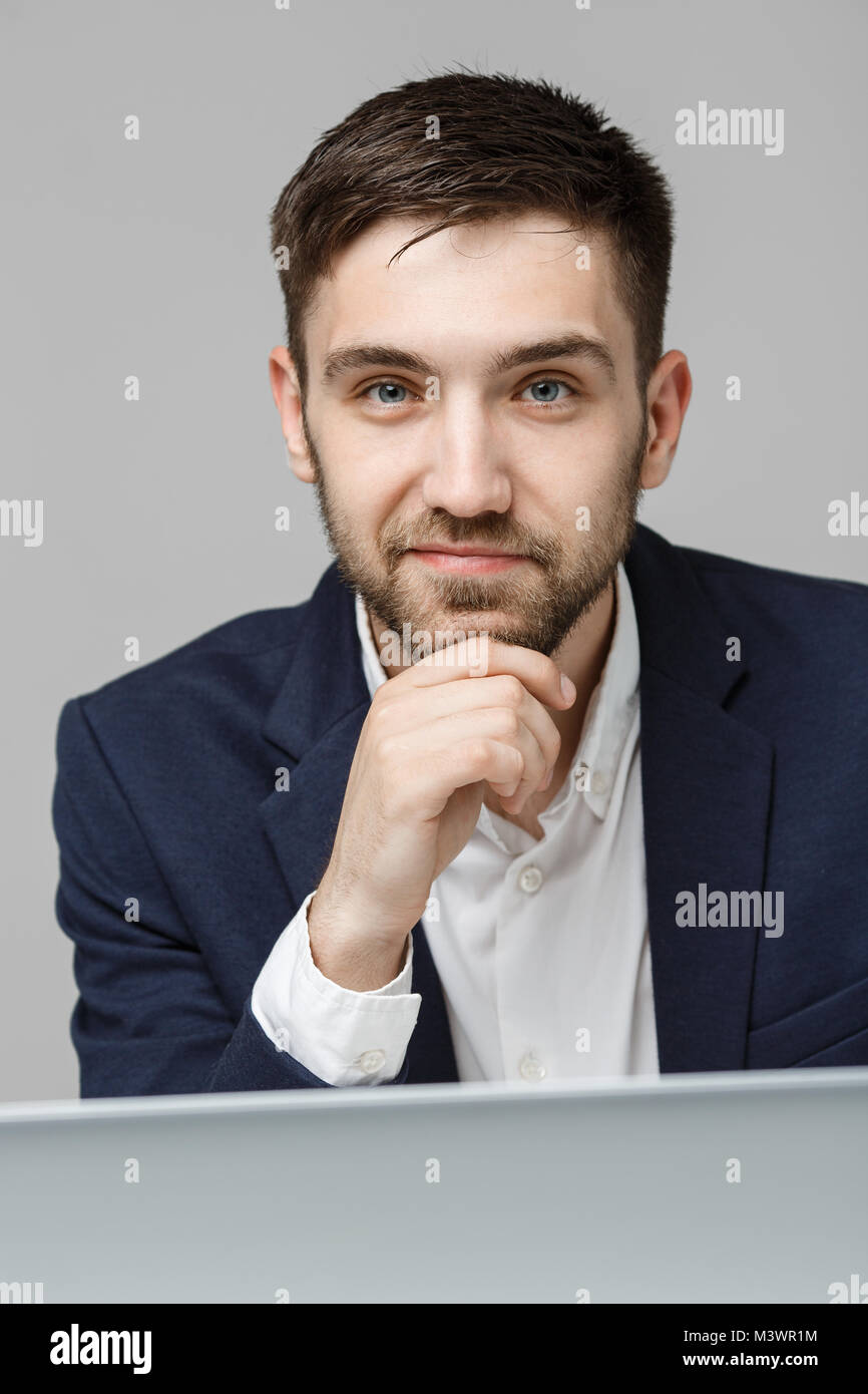 Business Concept - Portrait handsome serious business man in suit ...