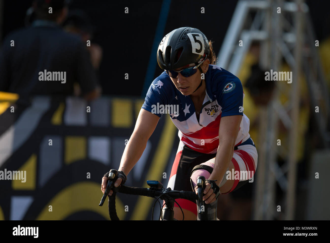 Army Capt. Kelly Elmlinger races a bicycle during the the 2017 Invictus ...