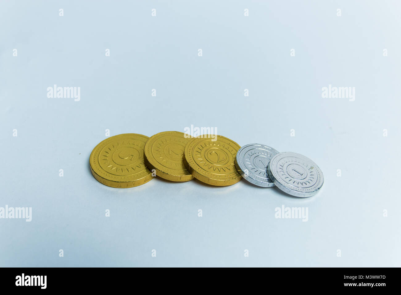 Gold wrapper wrappers hi-res stock photography and images - Alamy