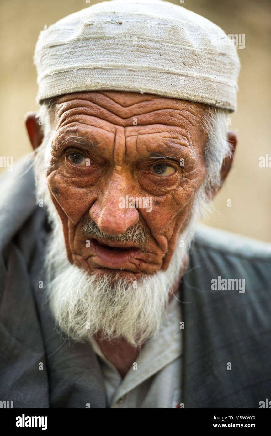 An Afghan village elder talks with 455th ESFS Reaper team Airmen during ...