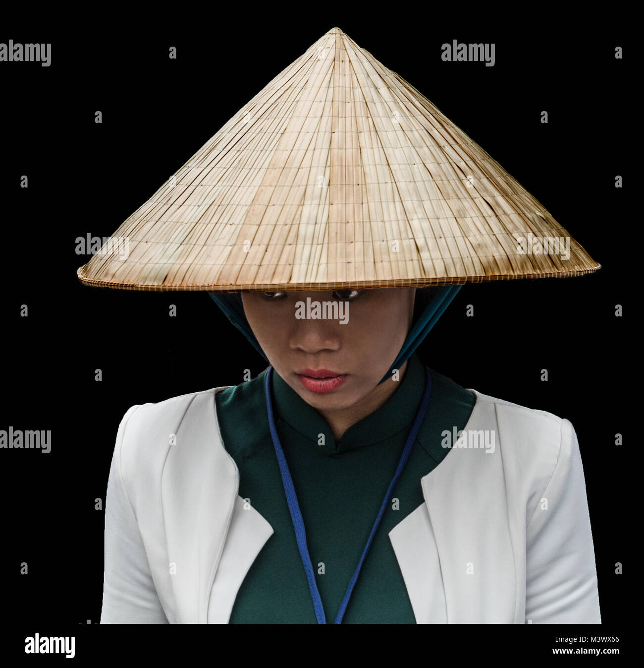 Vietnamese young lady wearing a traditional Vietnamese conical hat in ...