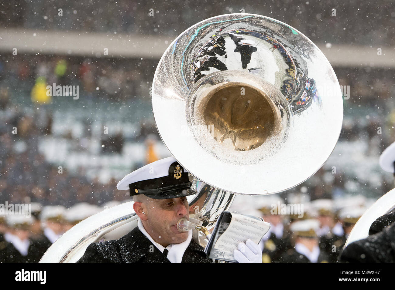 A Navy band member plays tuba for the United States Naval Academy march ...