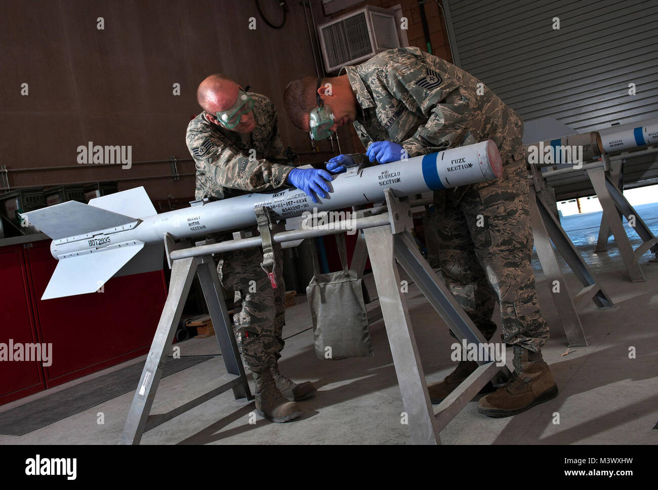 Staff Sgt. Daniel Manzer (left) and Tech. Sgt. Jonathan Kidd, both ...