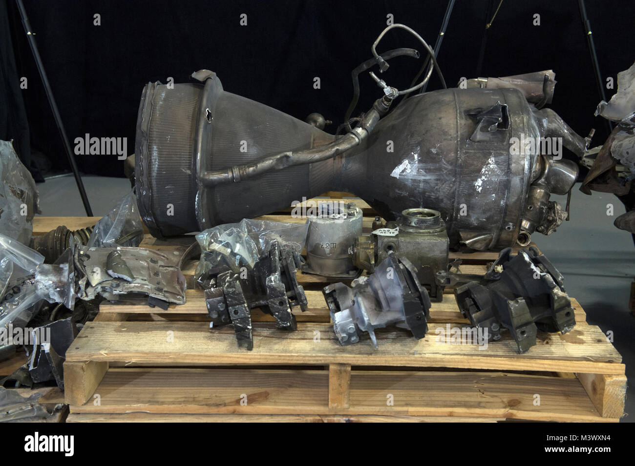 A display shows recovered Iranian Qiam class ballistic missile remnants ...