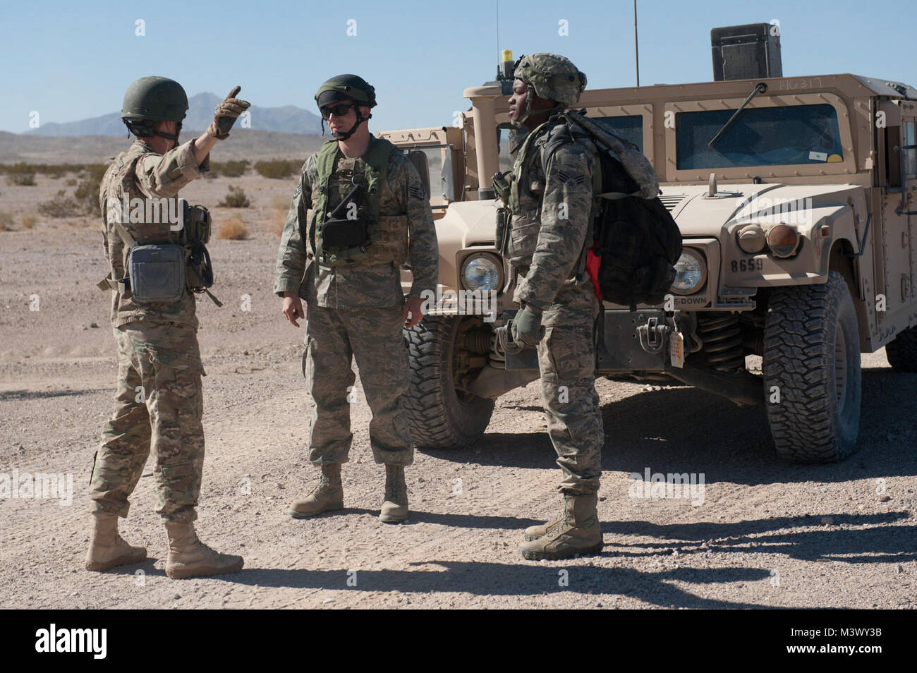 Tech. Sgt. Rick Lawson (left) talks with Senior Airman Michael ...