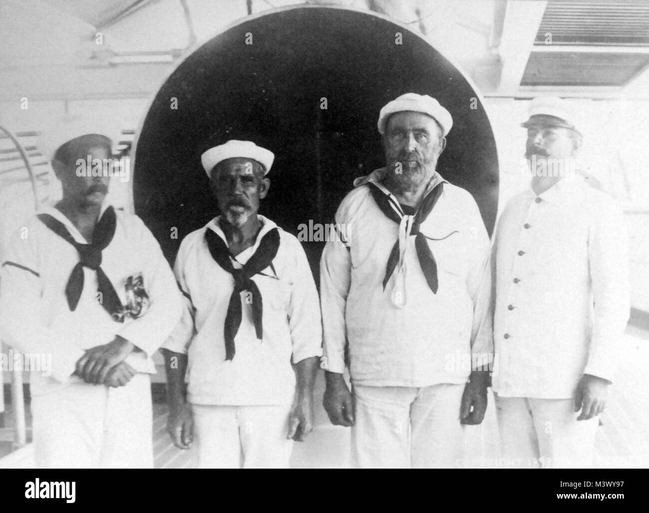 PR-3-Box-35-8: USS Olympia (Cruiser #6). Four men on deck. Courtesy of ...
