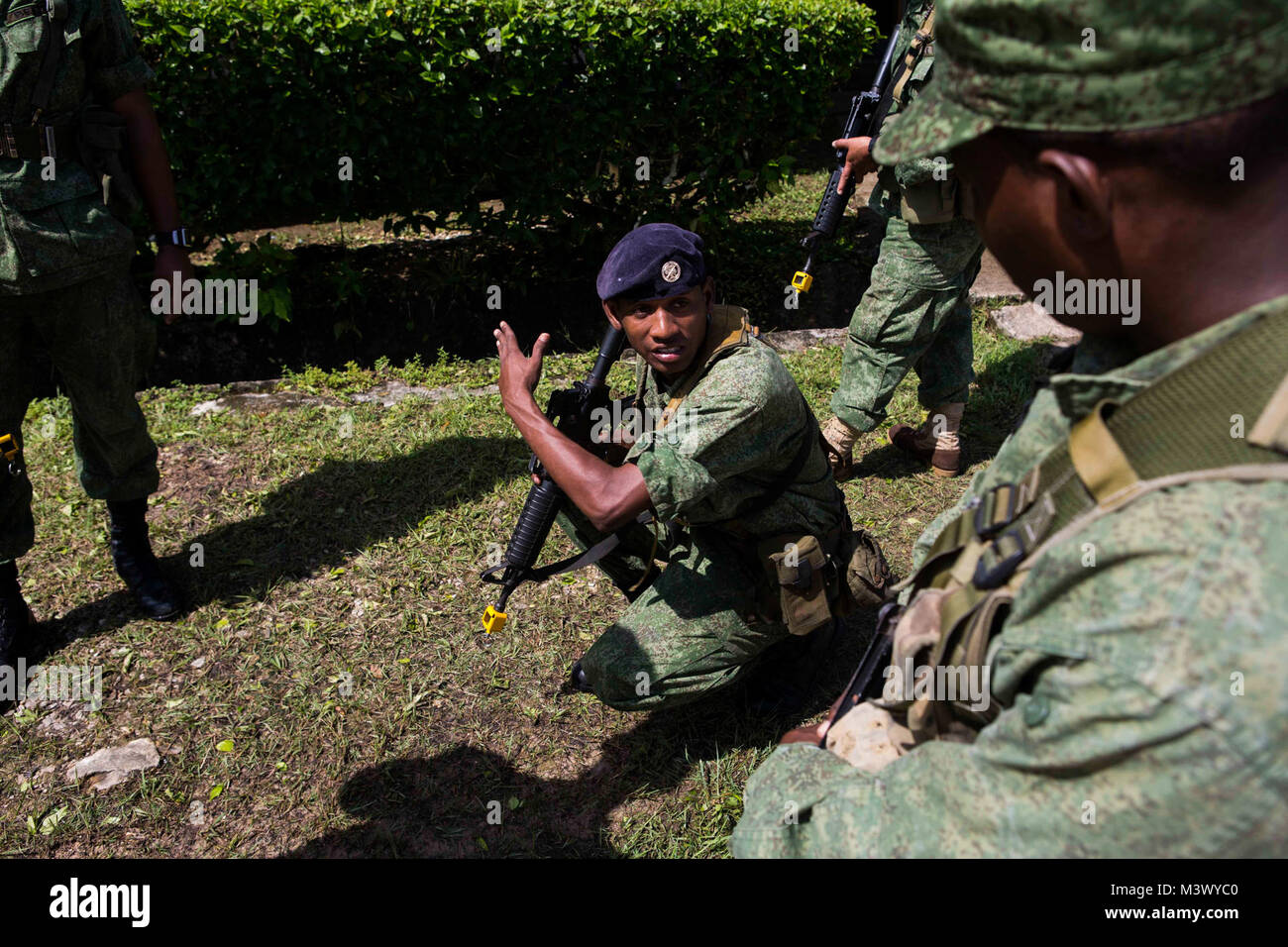 Belize Defense Force Pvt. Darren Petillo speaks with his soldiers ...