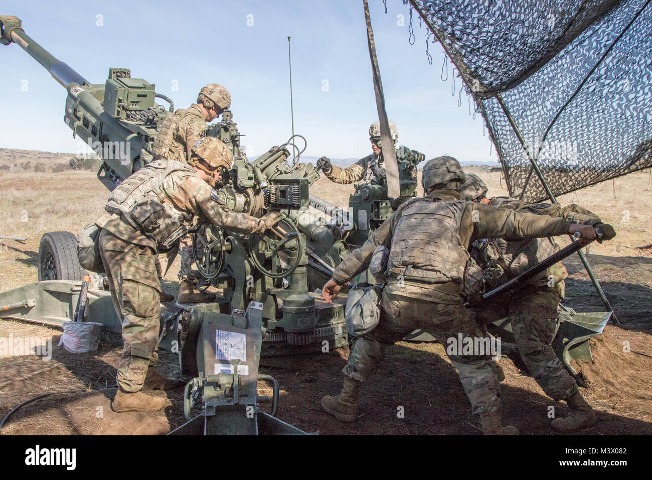 Soldiers of A Battery, 1-37 Field Artillery, hone their artillery ...