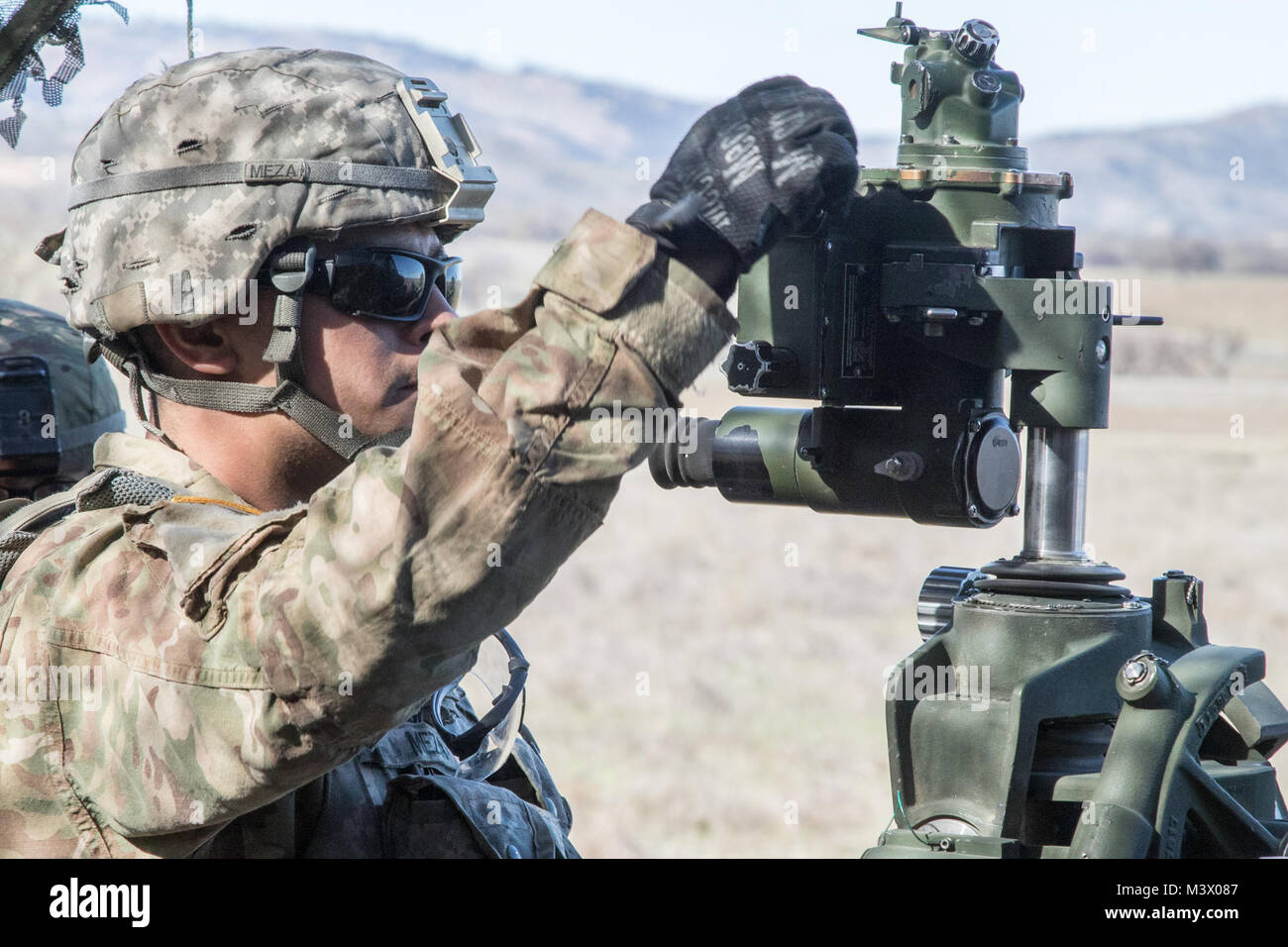 Soldiers of A Battery, 1-37 Field Artillery, hone their artillery ...
